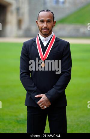 Sir Lewis Hamilton after he was made a Knight Bachelor by the Prince of ...