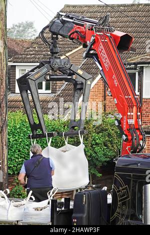 a construction or builders merchants delivery lorry at a building site ...