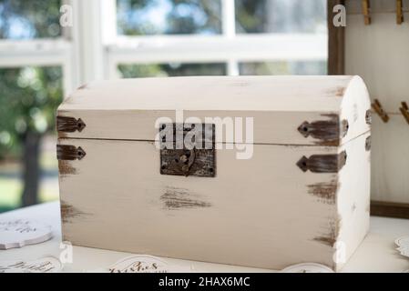 A white wood box for cards at the wedding reception Stock Photo - Alamy