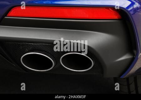 Car exhaust pipes. Car details. Part of the car. Blue Stock Photo - Alamy