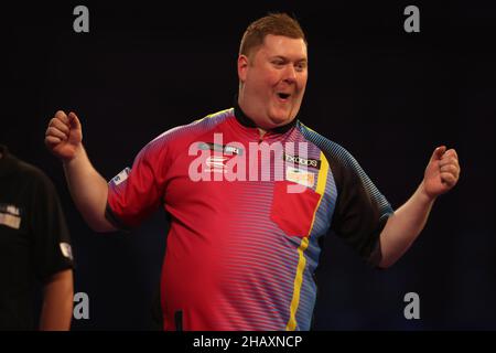Ricky Evans celebrates winning his first round match against Gordon ...