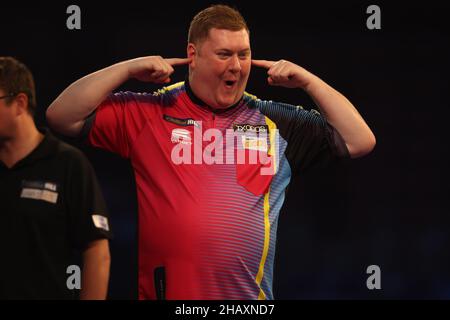 Ricky Evans celebrates winning his first round match against Gordon ...