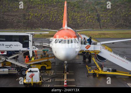 passengers boarding Easyjet plane at Funchal Madeira international ...