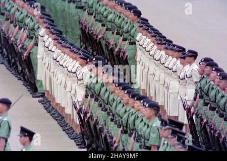 Commissioner of Police, Mr LI Kwan-ha reviews officers on parade during ...