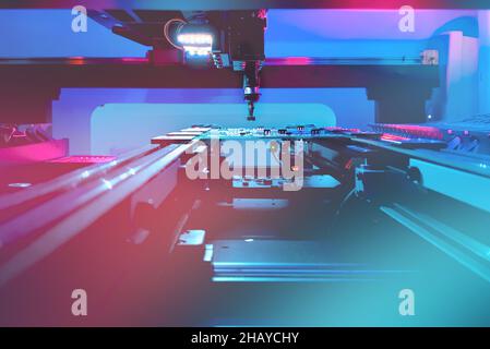 Automation of industry Chip Components: neon lights illuminate on SMT ...