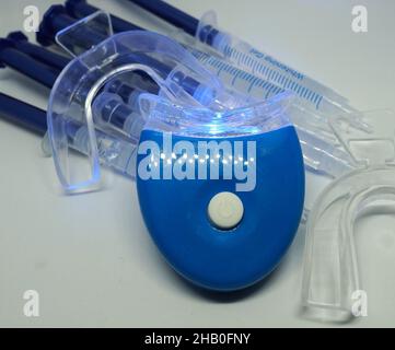 Teeth whitening equipment and syringes on a white surface Stock Photo ...