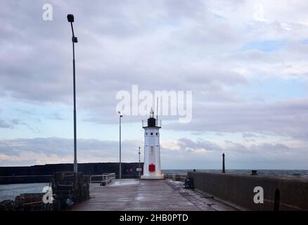 Anstruther lighthouse in Scotland. Horizontal photograph. Cloudy day ...