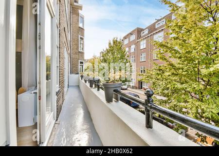 Design of a delightful balcony in an elite apartment Stock Photo - Alamy