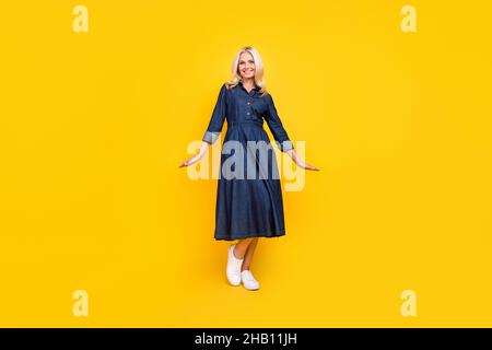 Photo of pretty cute lady pensioner dressed blue pullover showing two ...