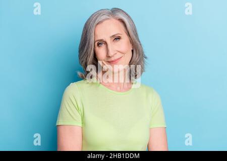 Photo of adorable charming retired woman blue sweater smiling isolated ...