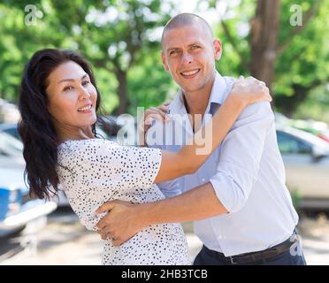 Romantic French couple having a date near the Eiffel tower. Closeup of ...