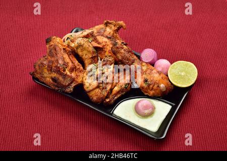Tandoori Chicken with Chutney Onion in Plate Stock Photo - Alamy