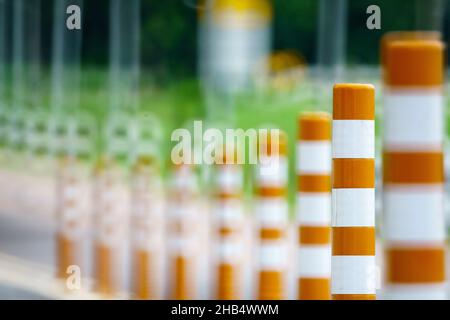 Flexible traffic bollard for bike lane Stock Photo - Alamy