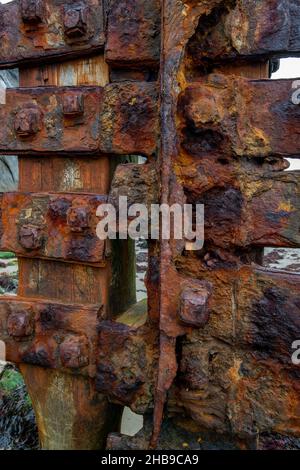 rusty corroded breakwater or groyne on the beach on the isle of wight ...