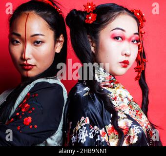 young pretty real geisha in kimono with sakura and decoration on Stock ...