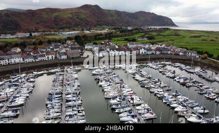 Aerial view of luxury boats on the Mediterranean Sea framed by blooming ...