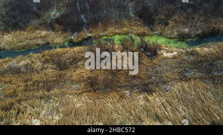 Autumn field and meadows with small stream Stock Photo - Alamy