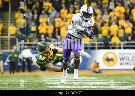 James Madison running back Jackson McCarter (21) shakes off defensive ...