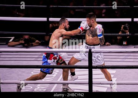 Liam Paro (L) in action against David Papot during their IBF ...