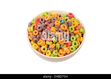 Colorful rings cereal spill out into a bowl. Breakfast. Isolated on a ...