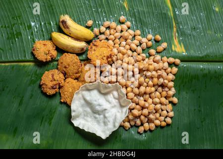 Traditional Onam Sadya served on a banana leaf on Festival day in ...