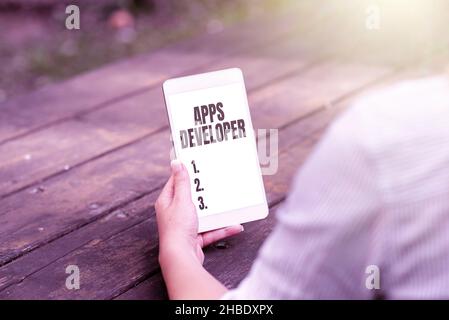 Writing displaying text Apps Developer, Business overview Graphic ...