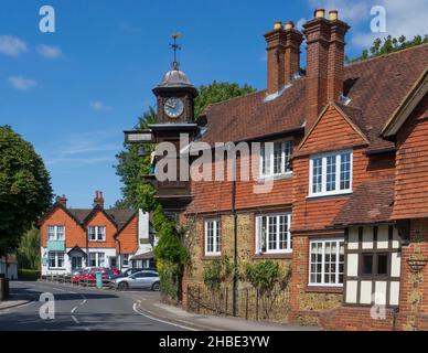 Abinger Hammer Clock overhangs the main road and portrays the figure of ...