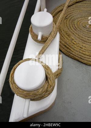 Thick rope on the deck of a ship Stock Photo - Alamy
