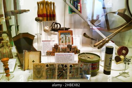 Old toys on display at museum Stock Photo - Alamy