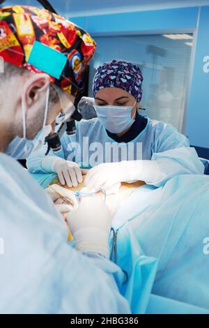 A team of surgeons is fighting for life, for a real operation, for real ...