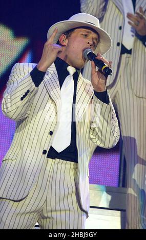 Westlife quartet less Brian McFadden perform on stage promoting their ...