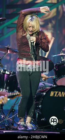 Hillary Duff performs on stage at the 2004 World Music Awards at the ...