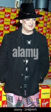 Former Culture Club frontman Boy George signs copies of his March 3 ...