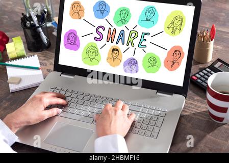 Share concept shown on a laptop screen Stock Photo - Alamy
