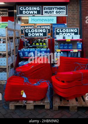 Closing Down Everything Must Go sign in a shop window indicating the ...
