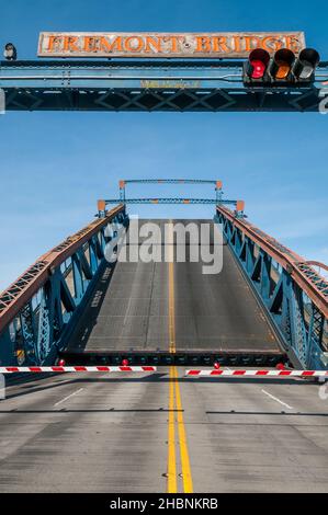 Seattle, Washington: The Fremont Bridge opens for a sailboat to pass ...