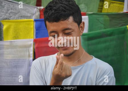 Closeup shot of a South Korean young female with a mask sitting on ...