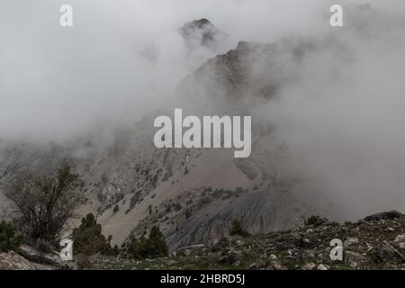 Rocks in mist in Fann mountains, Tajikistan Stock Photo - Alamy