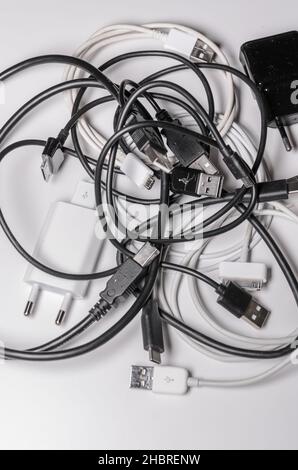 Many entangled charging cables for electronic devices and smartphones ...