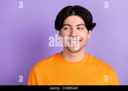 Photo of dreamy minded young charming woman look empty space imagine ...