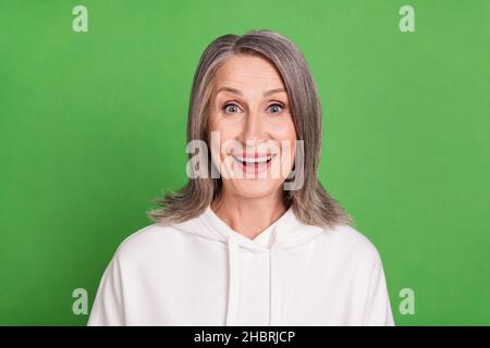 Photo of positive impressed lady wear stylish clothes arm touch white ...