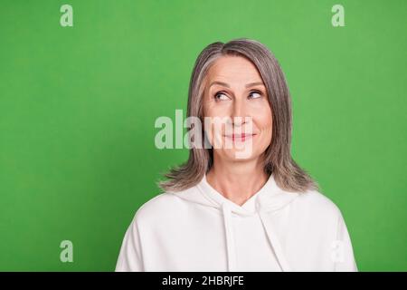 Photo of dreamy pretty girl dressed white blouse arm chin looking empty ...