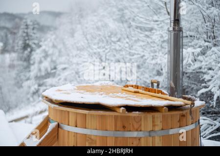 Wooden hot vat on terrace at mountains. vacation concept with hot bath ...