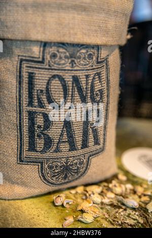 Peanuts at the Long Bar at the Raffles Hotel, Singapore Stock Photo - Alamy