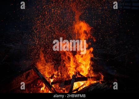 Big bonfire with sparks flying up, colorful space effect Stock Photo ...