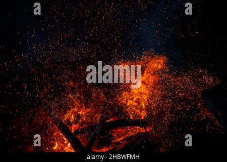 Big bonfire with sparks flying up, colorful space effect Stock Photo ...