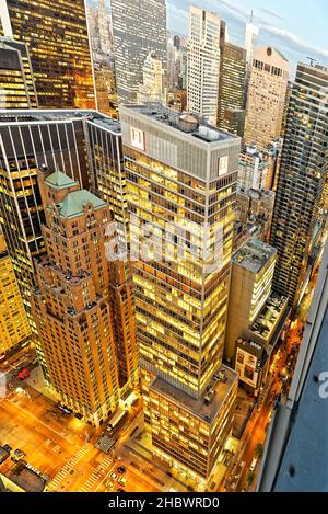 Manhattan midtown sunset rooftop view with urban skyscrapers in New ...