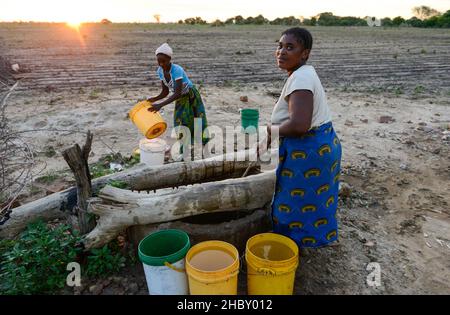 Women fetch water at dusk in the Korsi Refugee Camp in Birao, Central ...