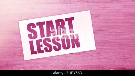 Start lesson words on card on wooden table. Education concept Stock ...
