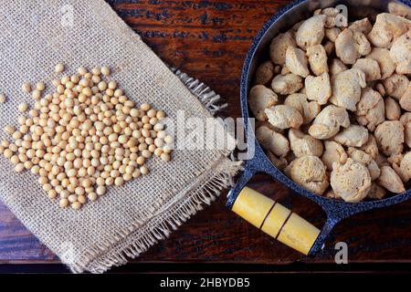 Fresh soybeans in rustic wooden bowl, mortar pestle, vibrant cherry ...